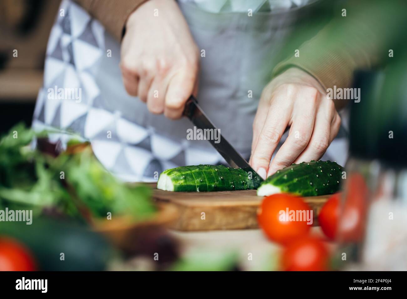 Cucumber hand hi-res stock photography and images - Alamy