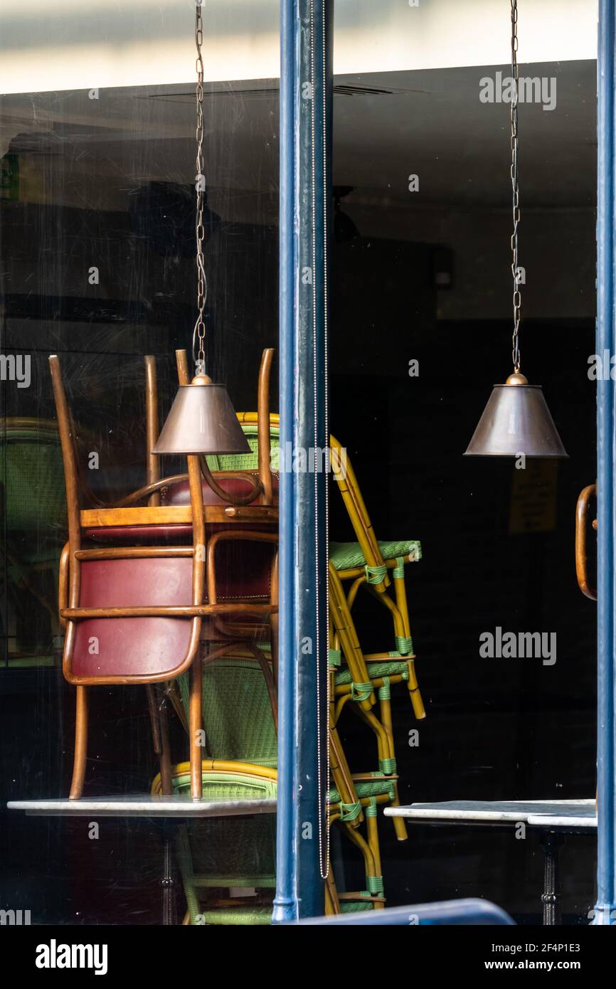 Window of an empty restaurant forced to close amid COVID-19 pandemic ...