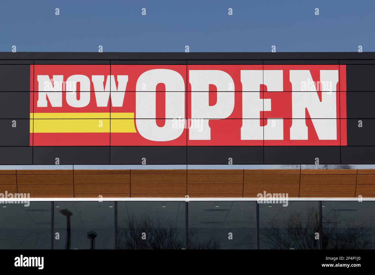 Now Open sign above a new neighborhood business Stock Photo - Alamy