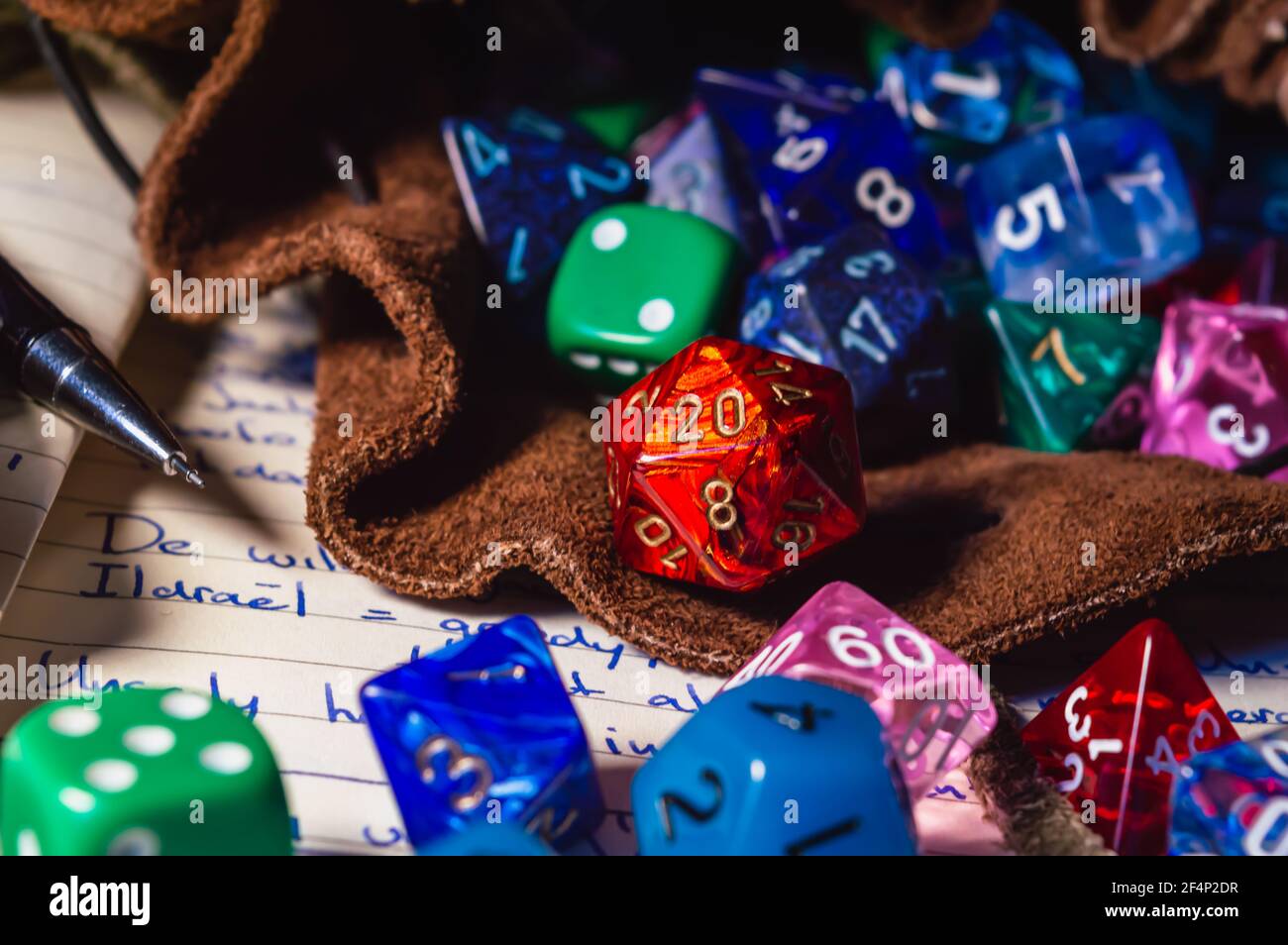 Close-up image of role playing dice of various shapes and colors ...