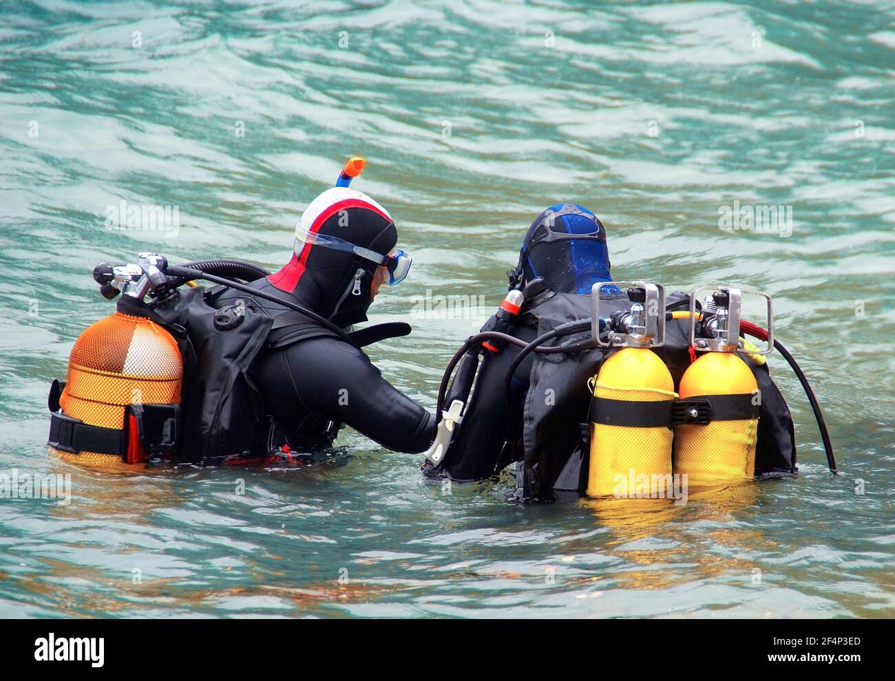 Divers with their equipment before immersion Stock Photo - Alamy