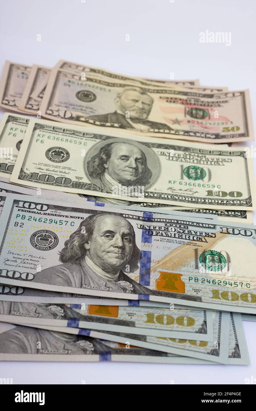 Bundle of dollars on the table close-up, one hundred dollars washington ...