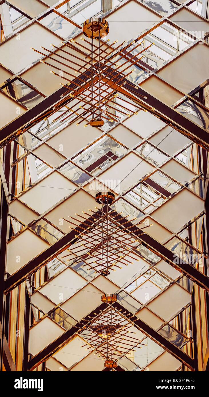 Stylish geometric ceiling of the building, dome with metal frame ...
