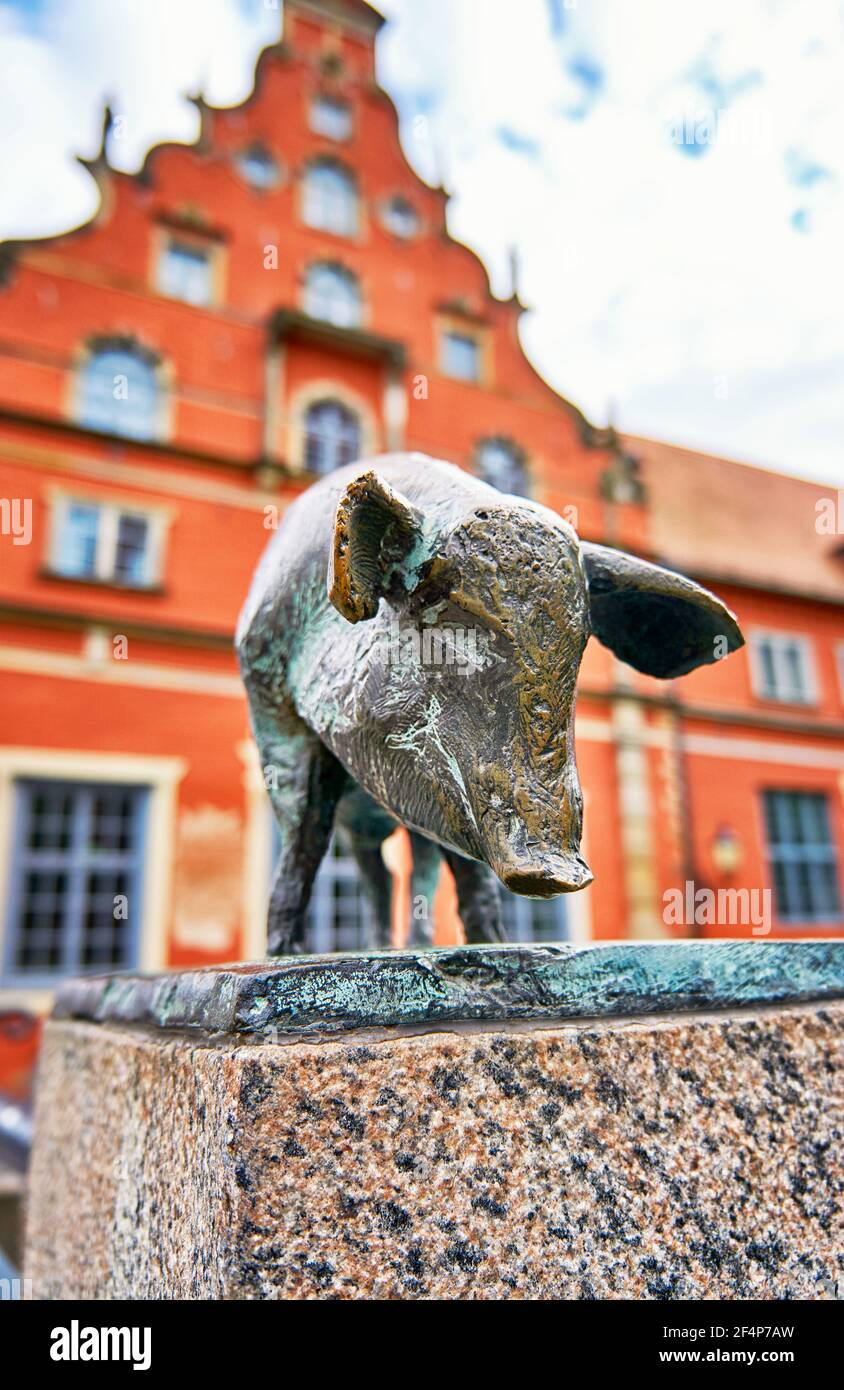 Standing pig as a bronze statue on the canal bridge in the city of ...