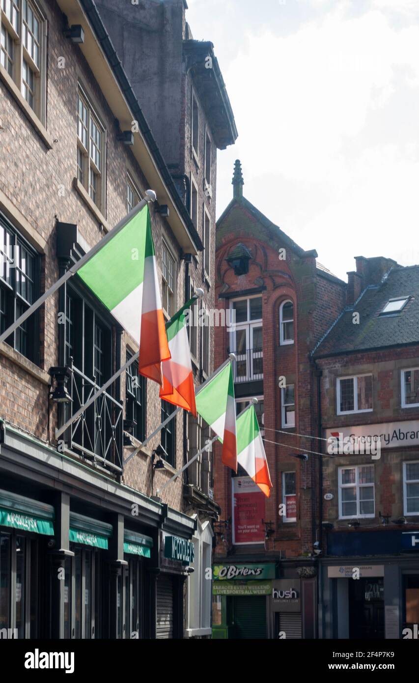 Four Irish flags flying outside McCooley's, a pub and pool hall in ...