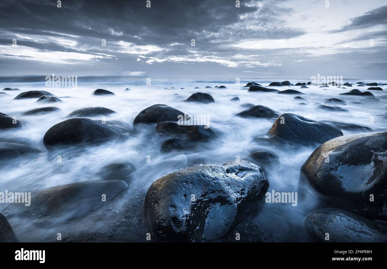Water flowing through stones hi-res stock photography and images - Alamy