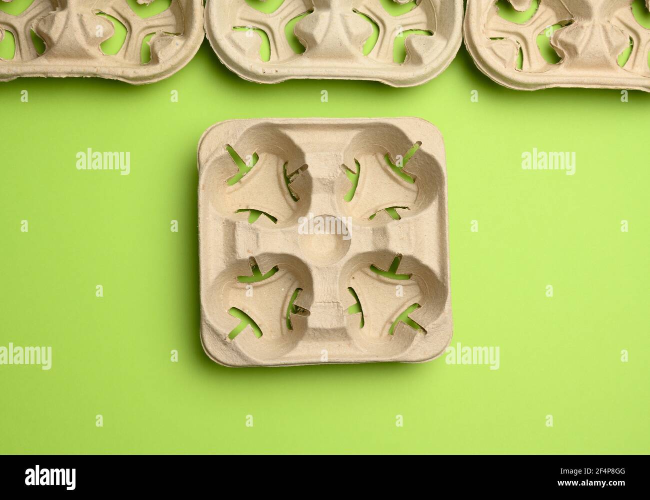 paper tray for drinks in takeaway cups on four cups on a green ...