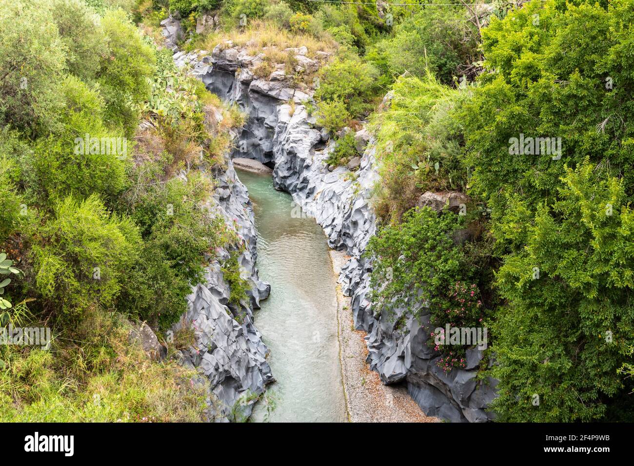 Basalt rocks and pristine water of Alcantara gorges in Sicily, Italy ...