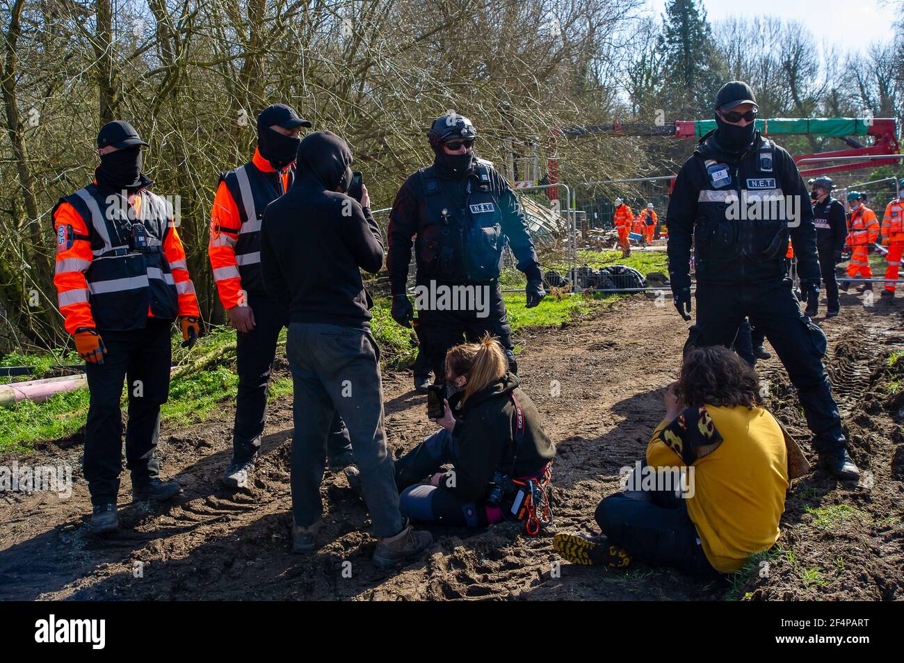 Denham, UK. 22nd March, 2021. Stop HS2 protesters watched on as HS2 ...