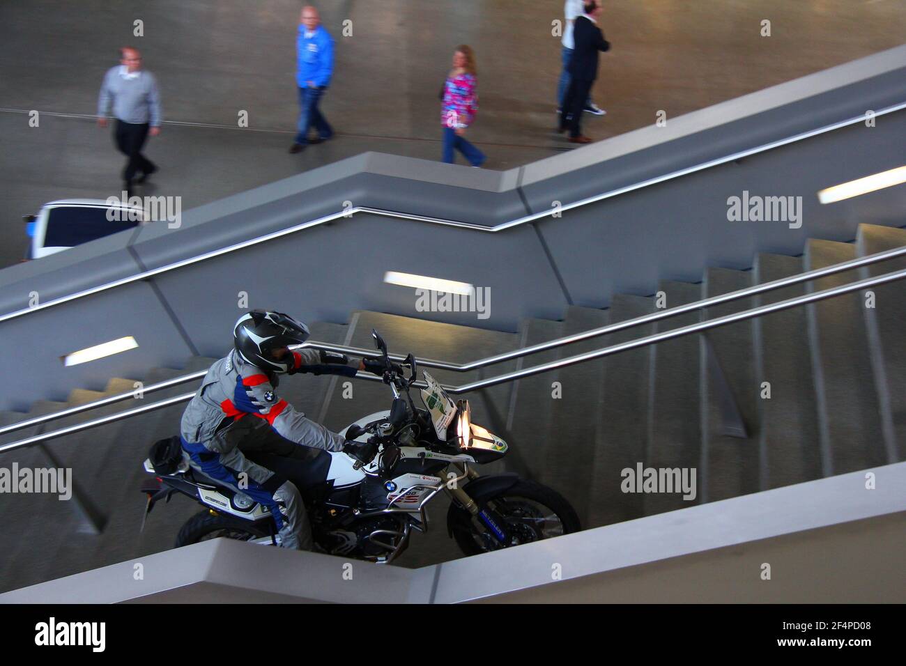 Bikers shows how to run up the stairs with the motorbike Stock Photo ...