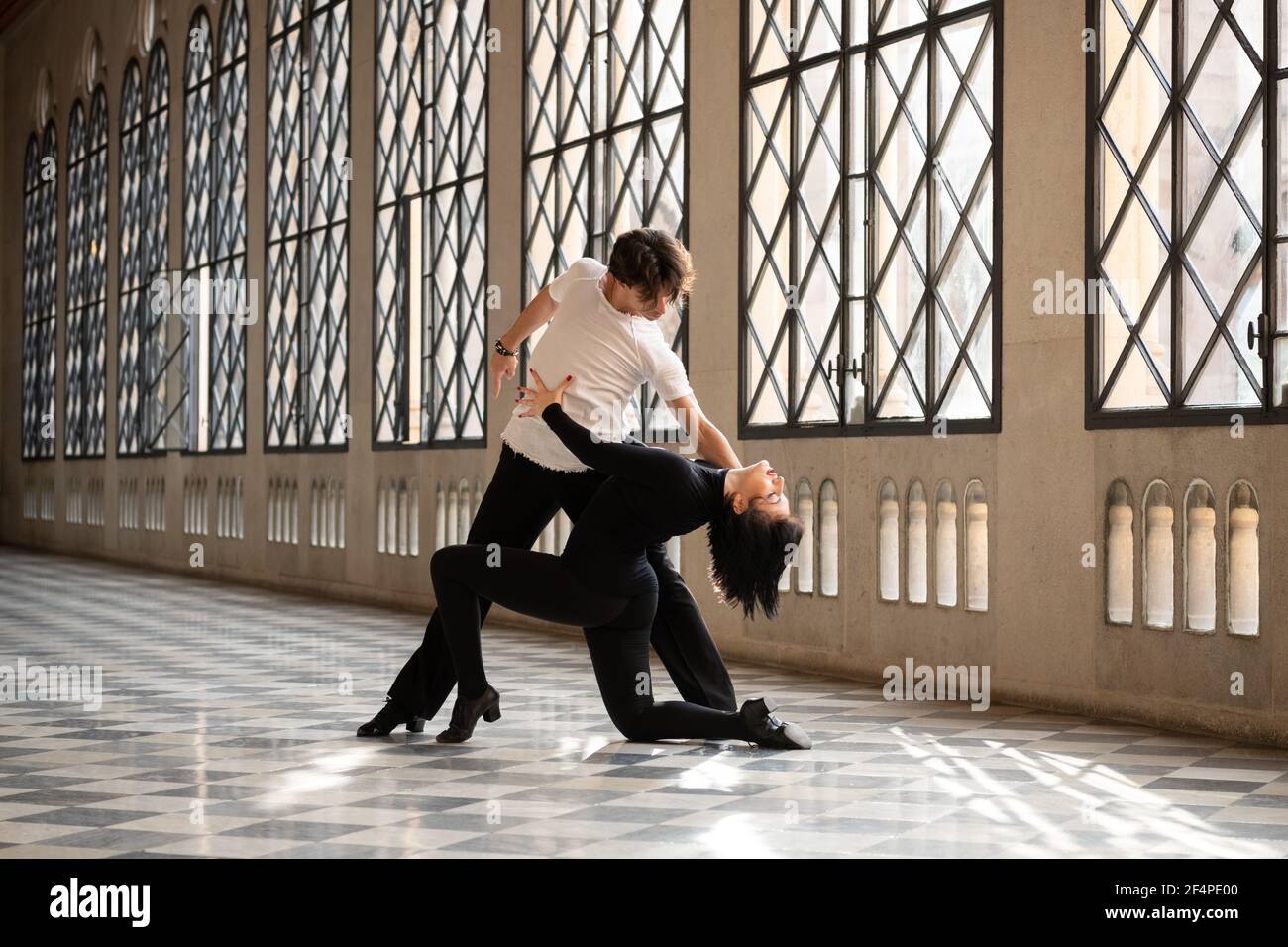 Male dancer tilting partner back Stock Photo - Alamy