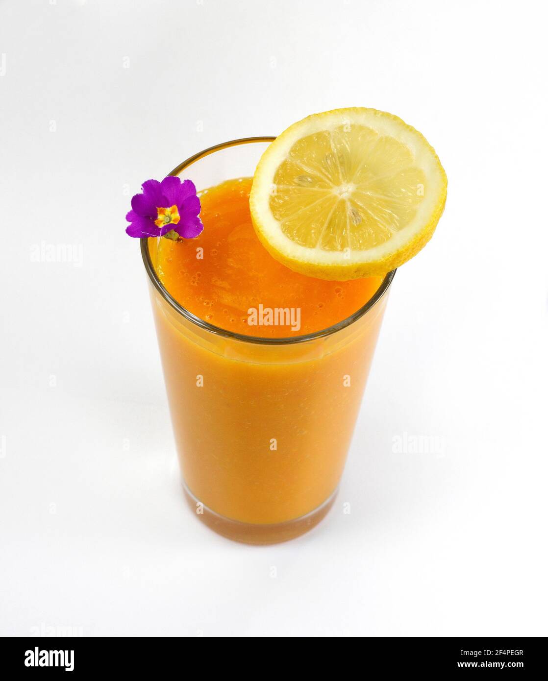 Glass of milkshake or cocktail isolated on white background. Mango ...