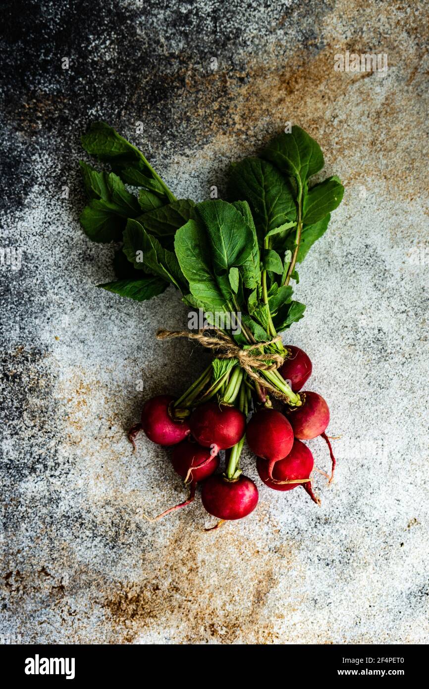 Healthy food concept with raw reddish vegetable Stock Photo - Alamy