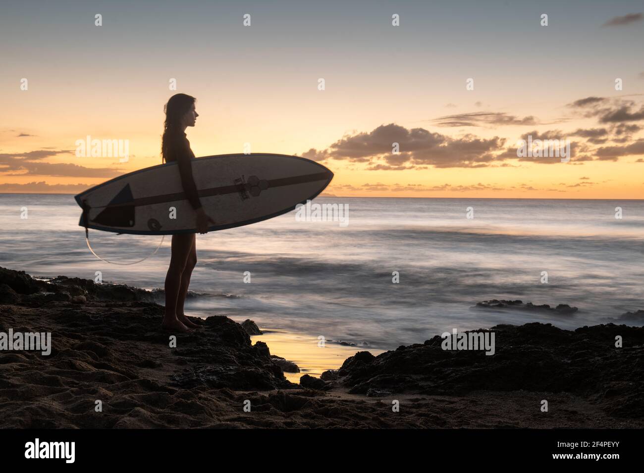 Surfer Girl Silhouette Sunset