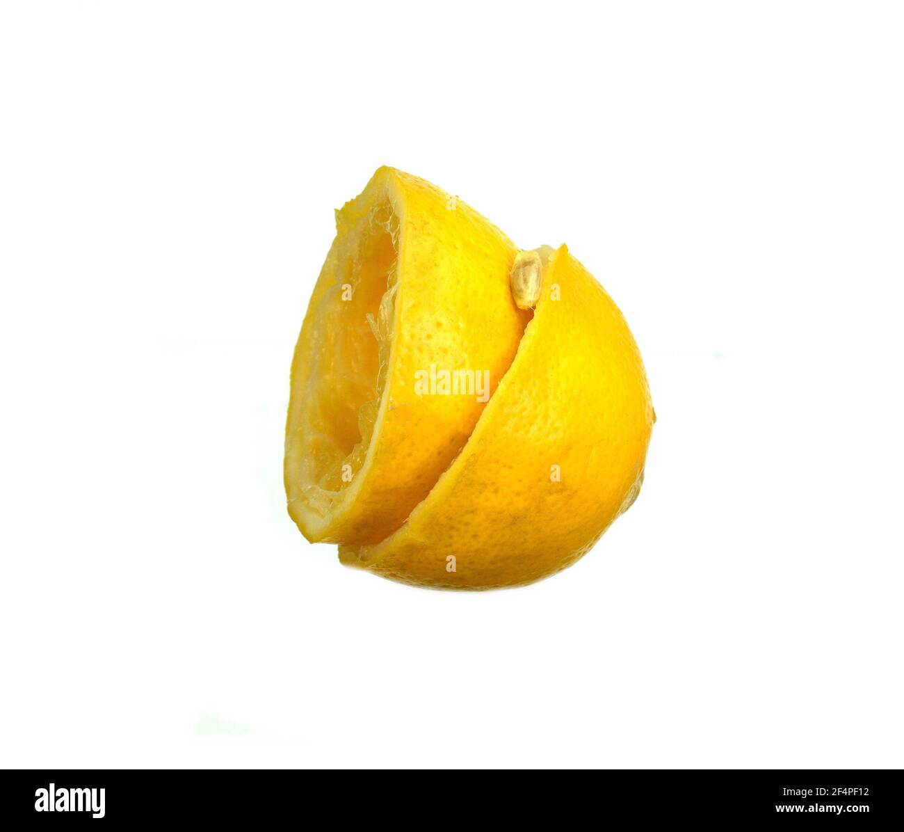 Lemon after squeezed isolated on white background Stock Photo - Alamy