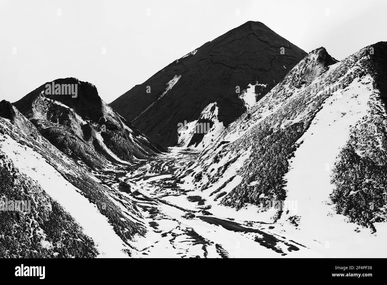 Gravel Pit Covered in Snow Looks like Mini Mountains Stock Photo - Alamy