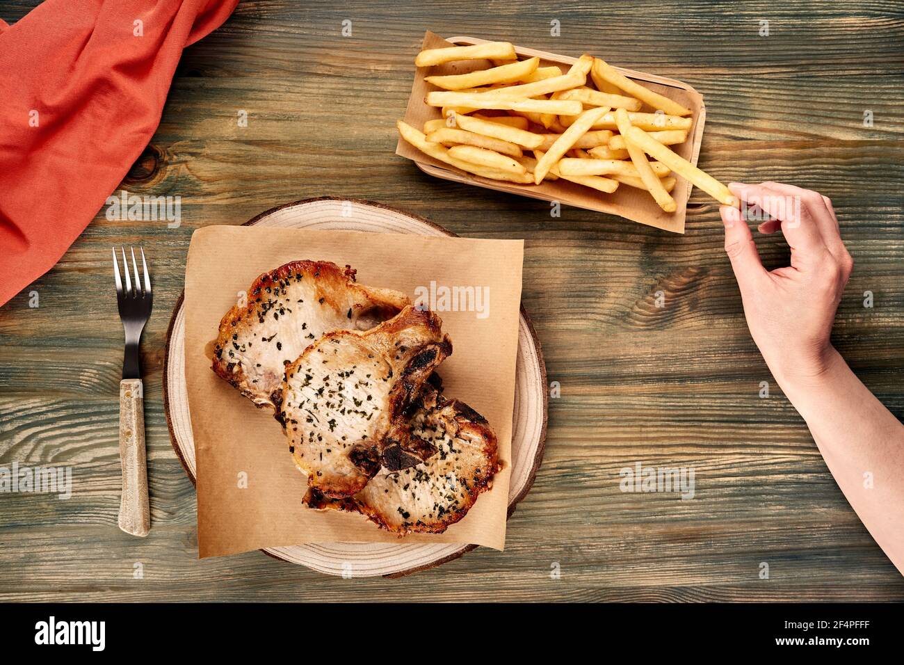 Hand with fries hi-res stock photography and images - Alamy