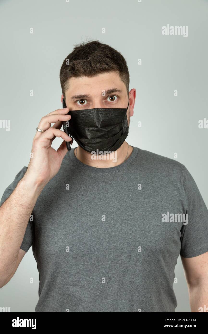 African man talks smartphone in hi-res stock photography and images - Alamy