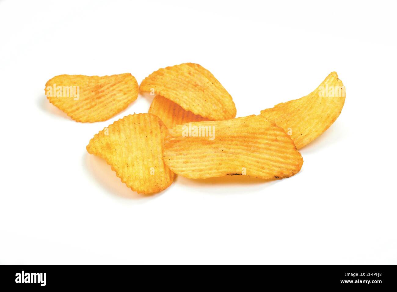 Ribbed potatoes snack chips close up isolated on white background Stock ...