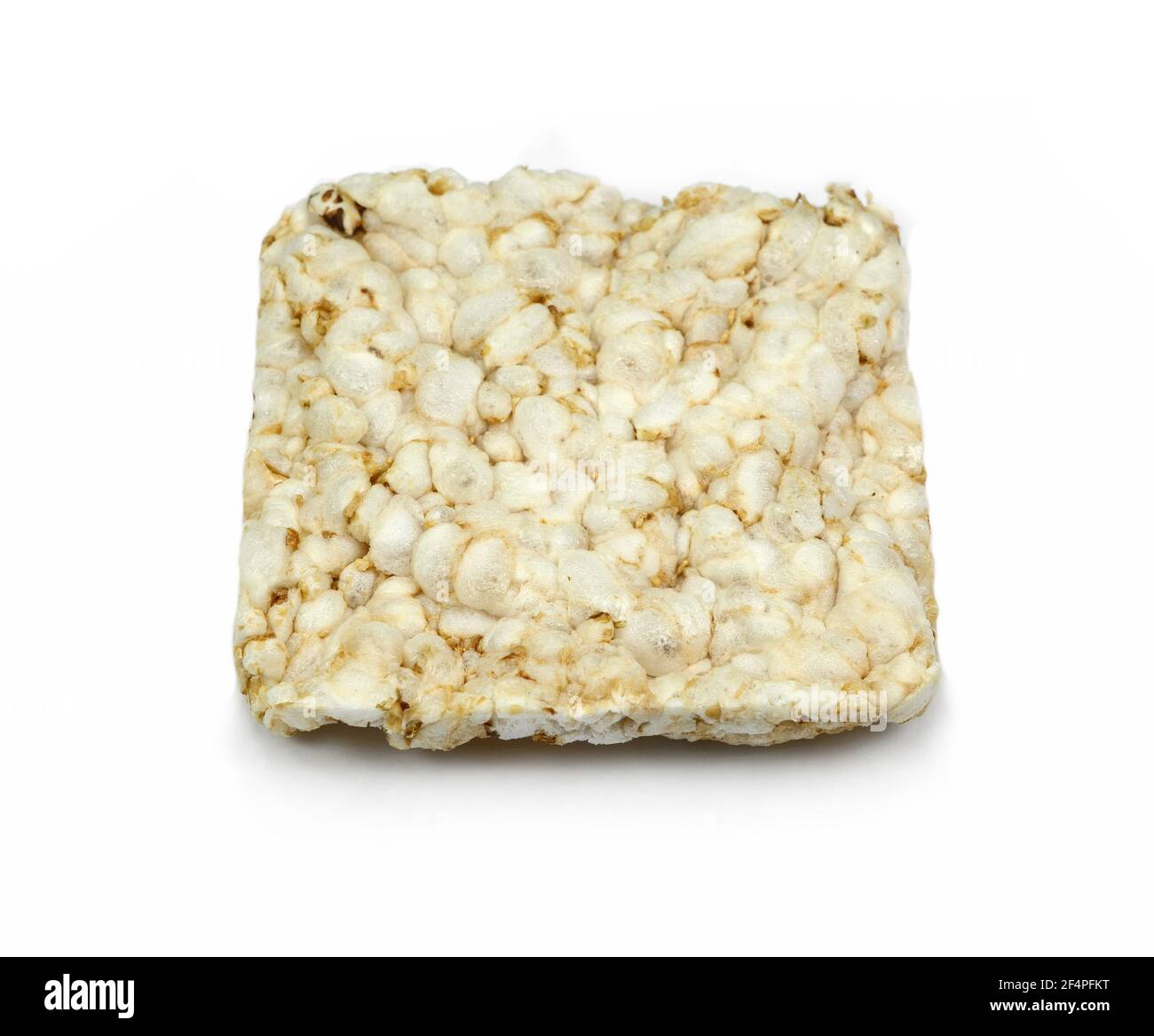 Puffed rice cakes isolated on white. Stack of puffed whole grain ...