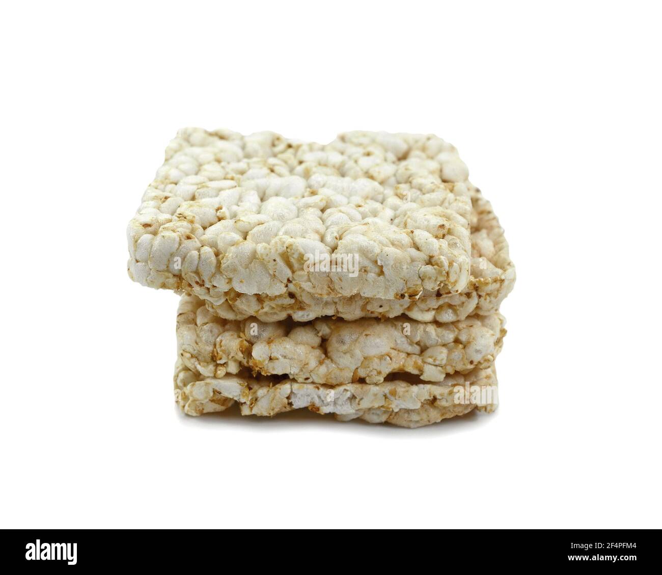 Puffed rice cakes isolated on white. Stack of puffed whole grain ...