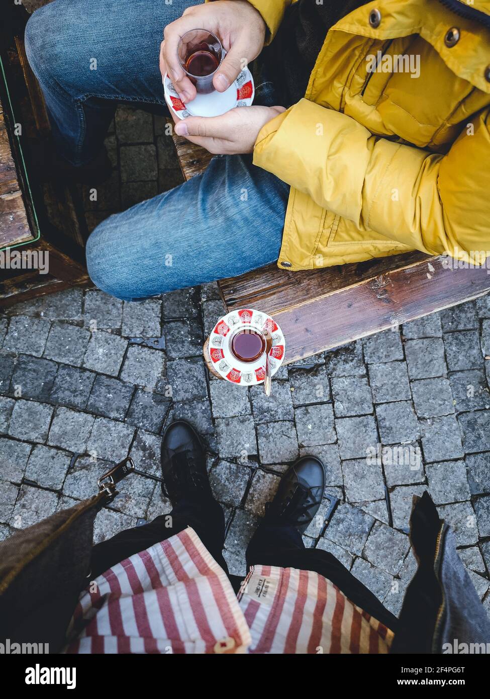 Drinking tea in middle eastern traditional tea cup Stock Photo - Alamy
