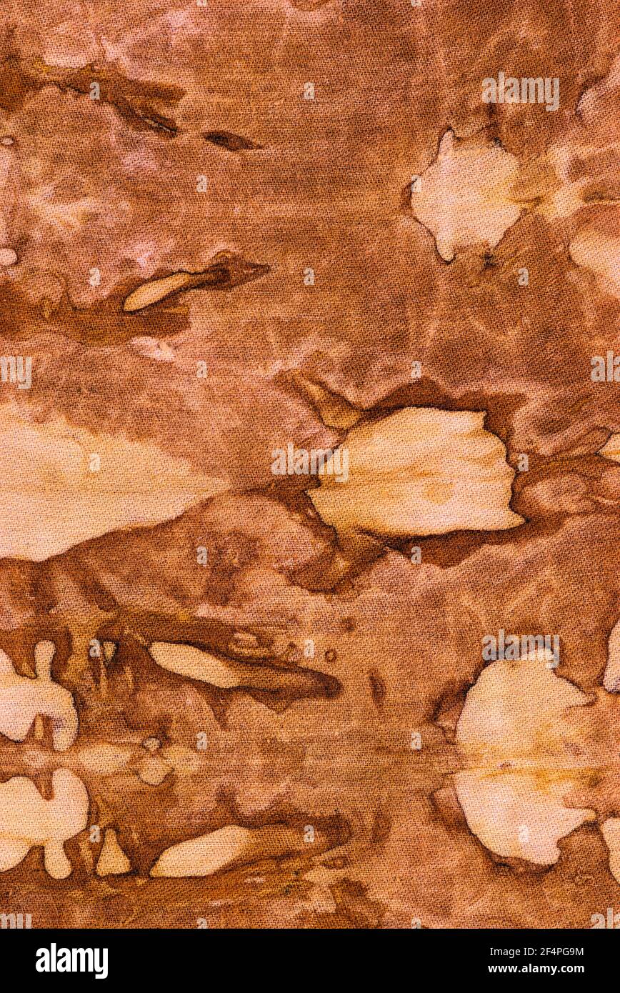 detail of a pattern in brown-ocher batik on a cotton fabric Stock Photo ...