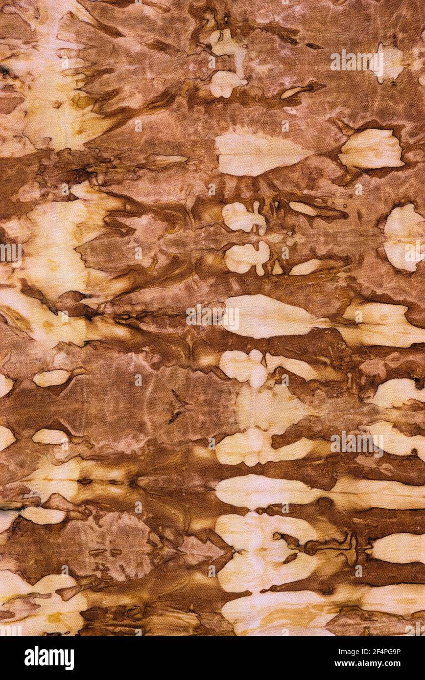 detail of a pattern in brown-ocher batik on a cotton fabric Stock Photo ...