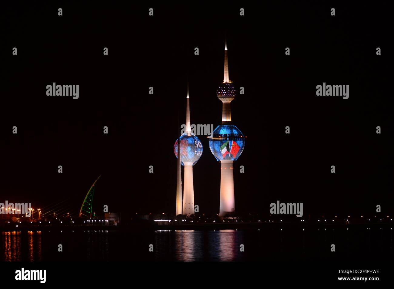Kuwait City. 22nd Mar, 2021. Kuwait Towers are illuminated with Chinese ...