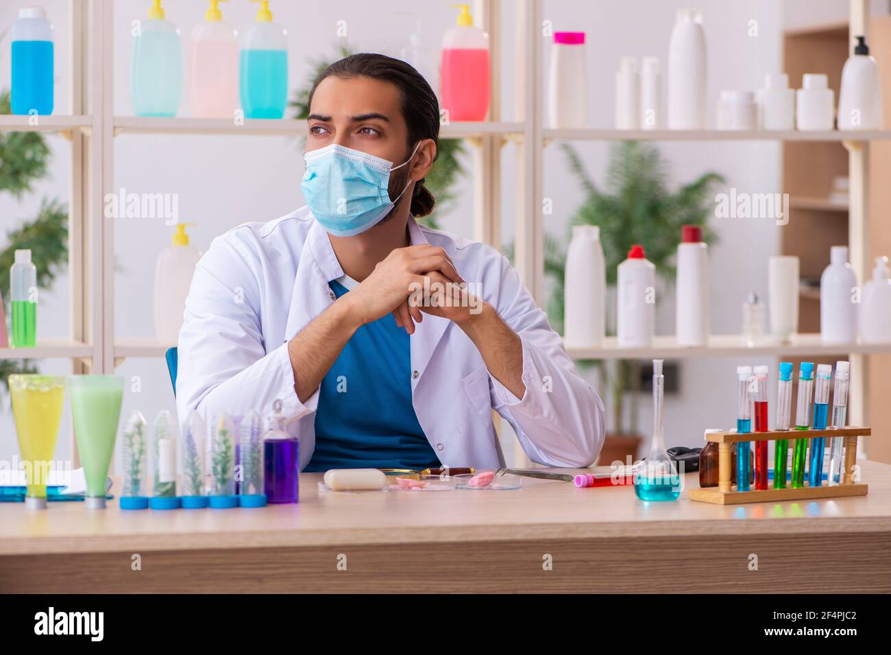 Young chemist testing soap in the lab Stock Photo - Alamy