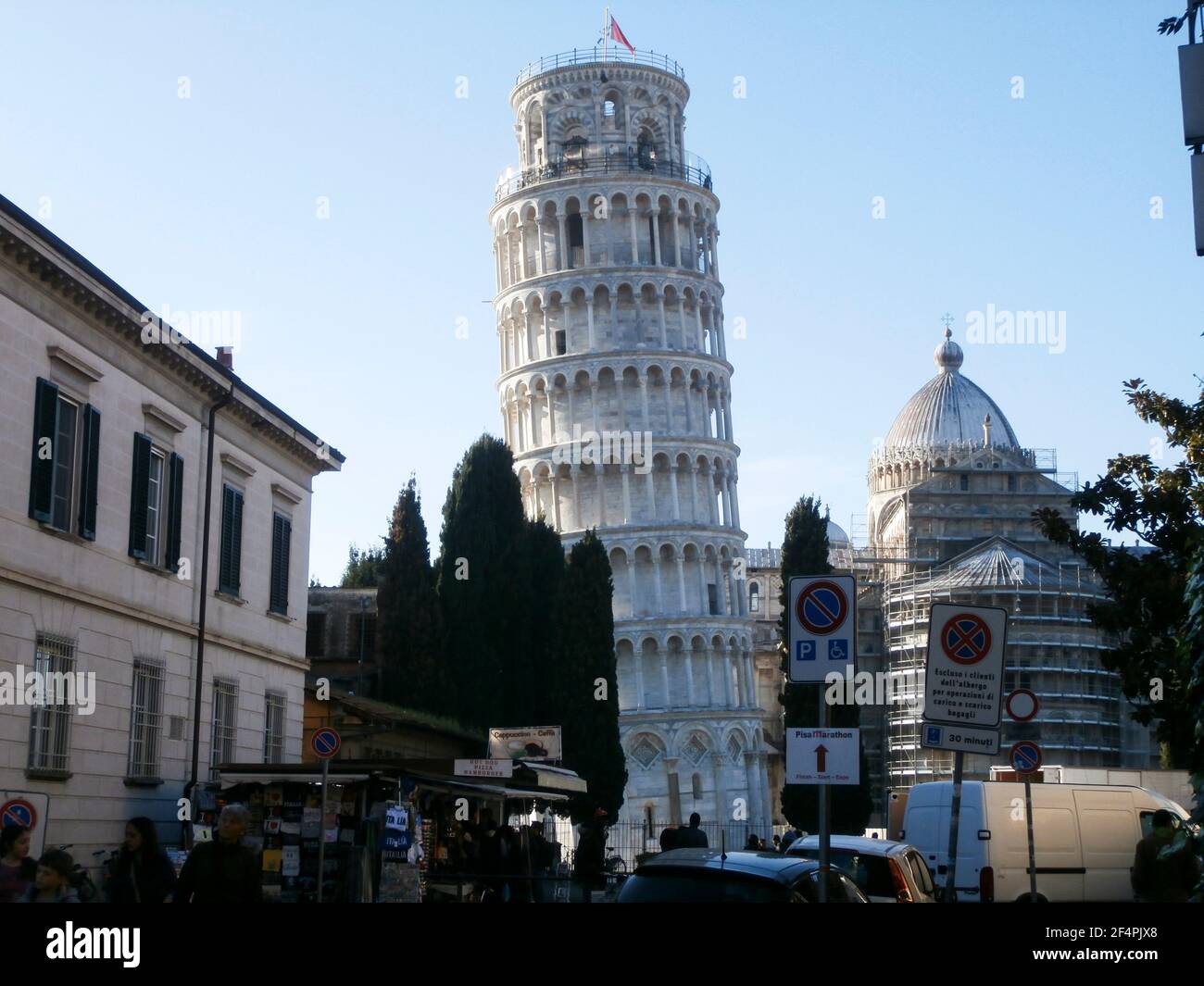 Pisa, Italy. Leaning Tower of Pisa with sunset light and blue sky on ...