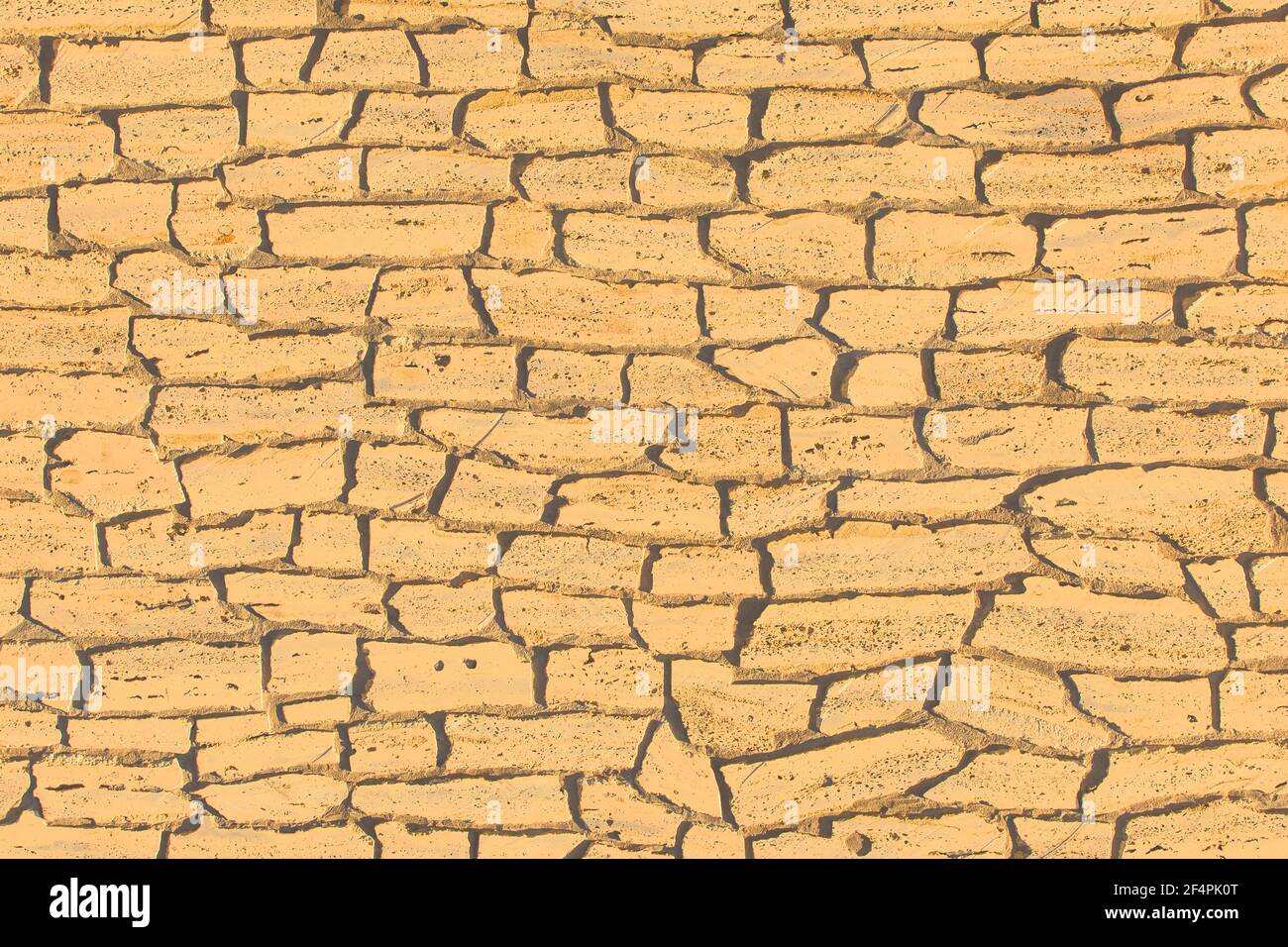 Sand color light yellow old stone brick wall ancient texture background ...