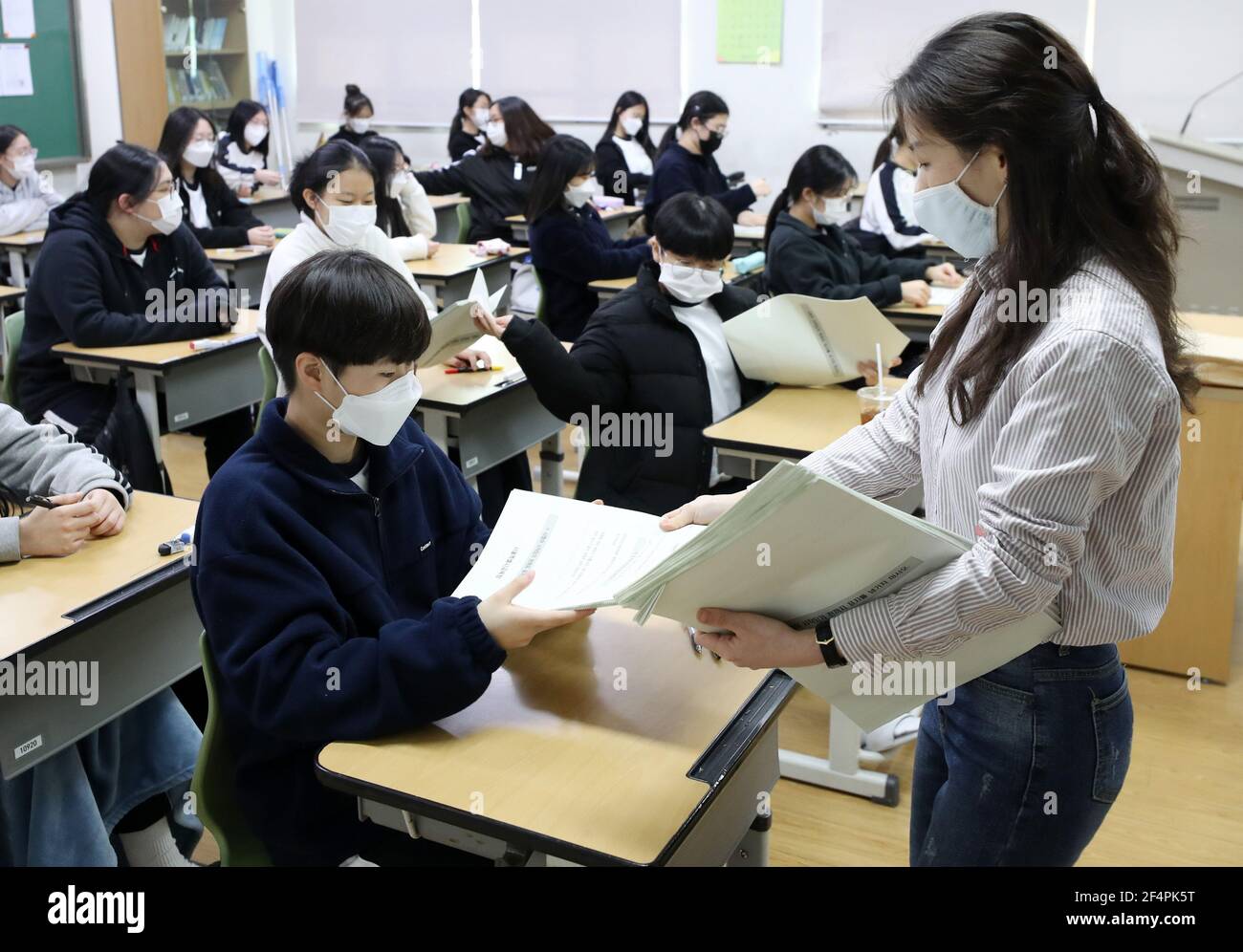 23rd Mar, 2021. Scholastic ability test at high school A teacher ...