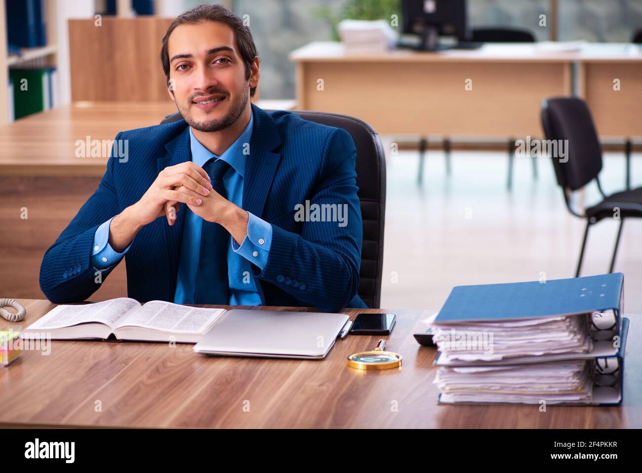Young man handbook office hi-res stock photography and images - Alamy