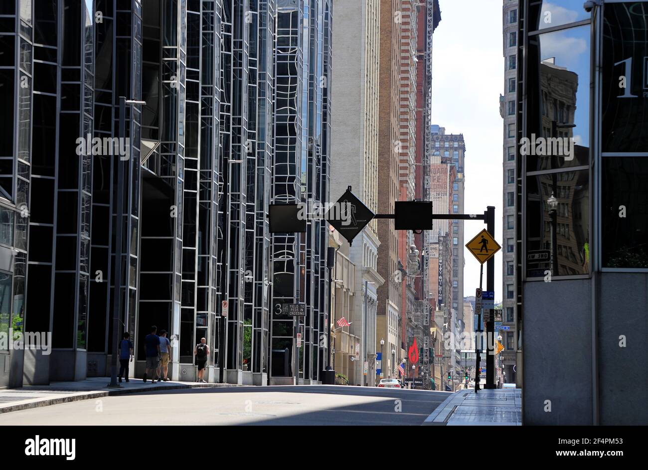The glass wall of PPG Place with other buildings in Downtown Pittsburgh ...