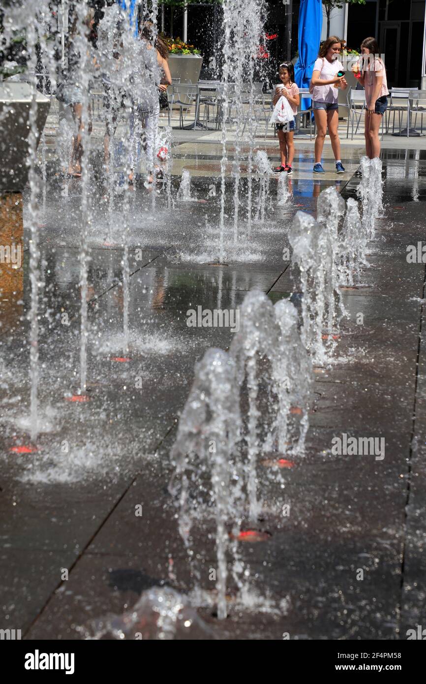 Children play in the fountain in the plaza of PPG Place in Downtown ...