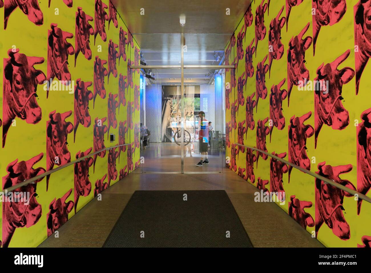 The entrance hallway decorated with screenprint Cow by Andy Warhol ... The entrance hallway decorated with screenprint Cow by Andy Warhol ...