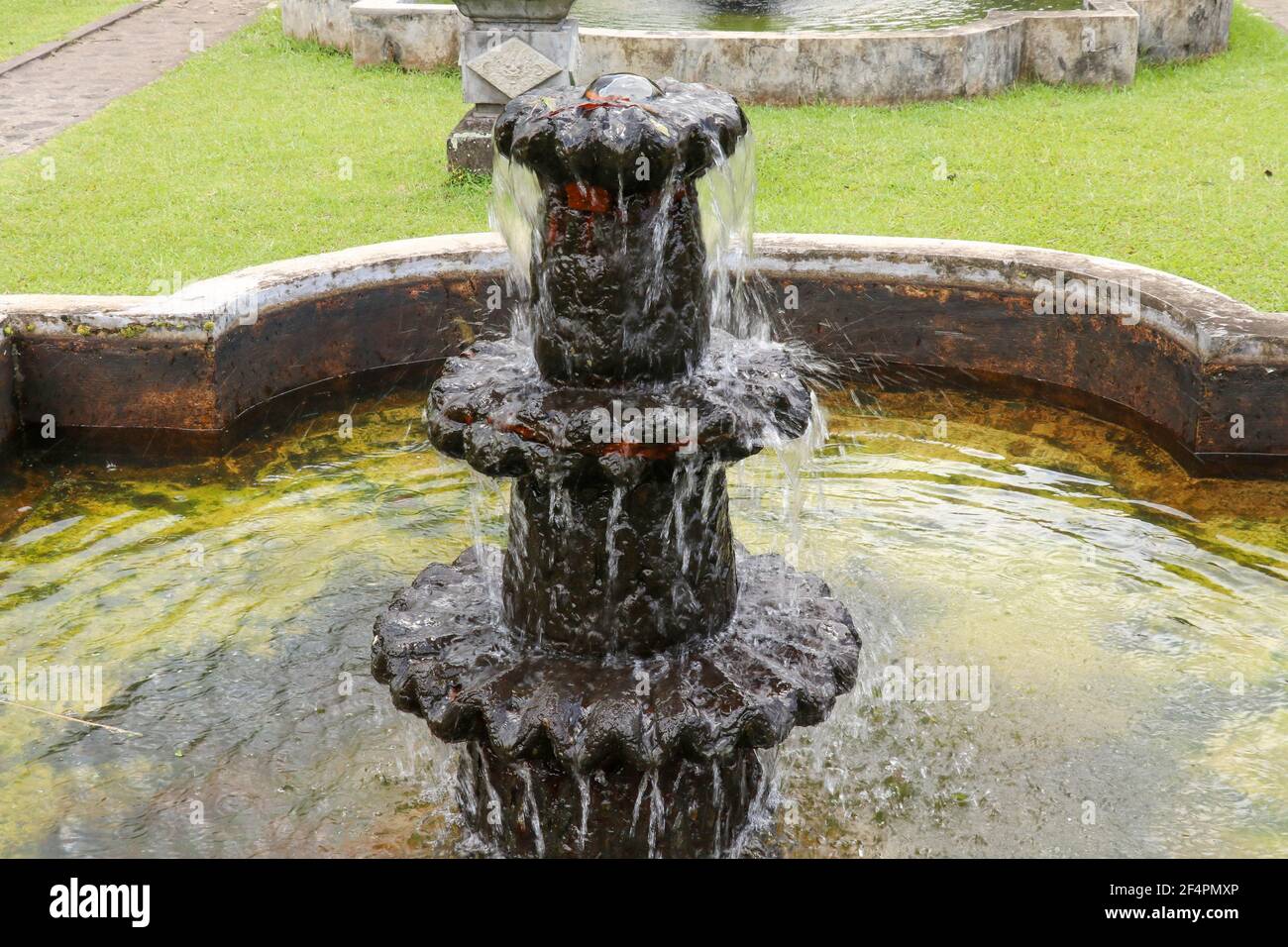 Fountain in Tirta Gangga water palace on Bali island, Indonesia Stock ...