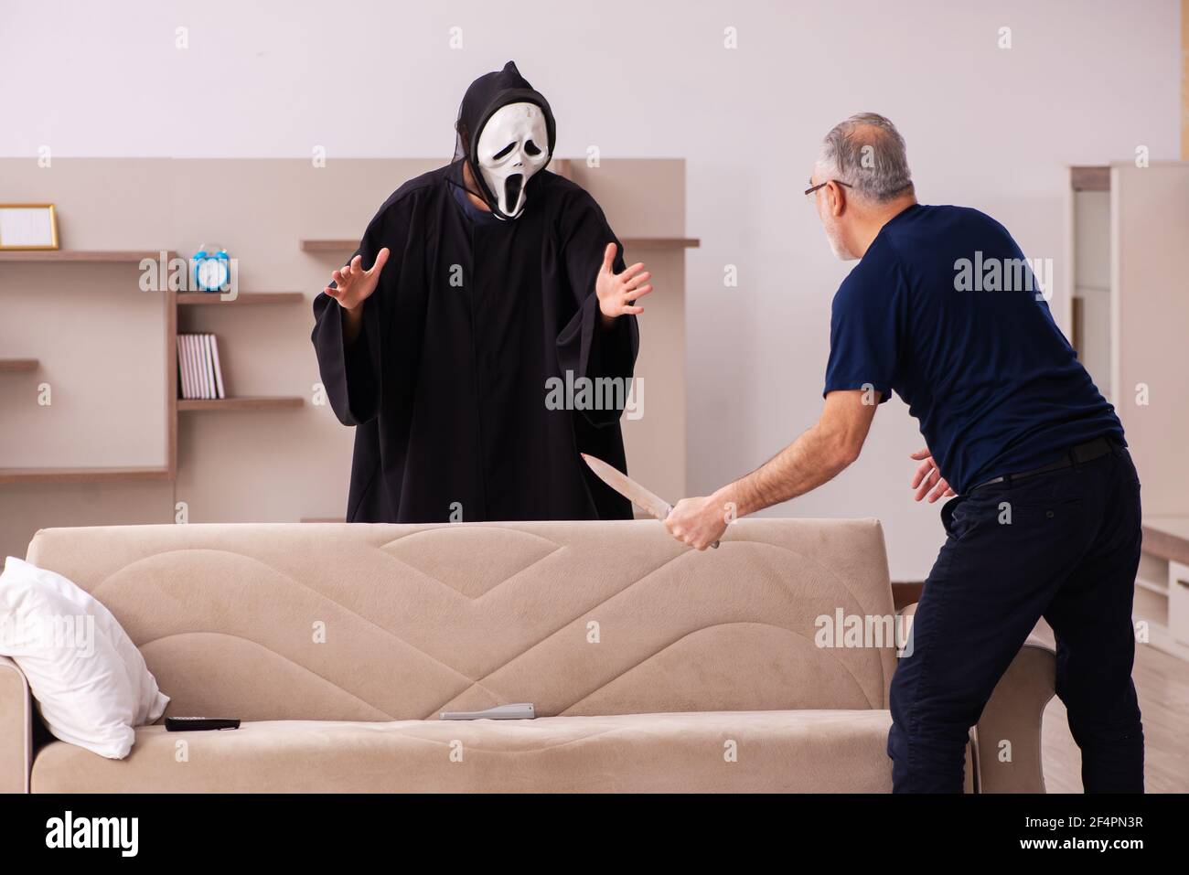 Devil coming to old dying man Stock Photo - Alamy