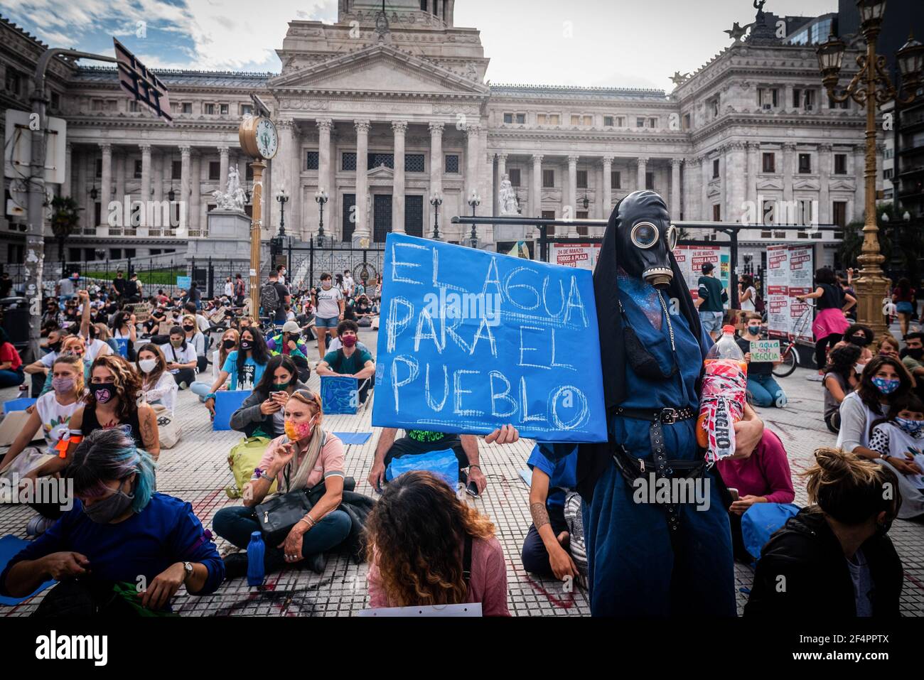 Buenos Aires, Argentina. 22nd Mar, 2021. A protester with a gas mask ...
