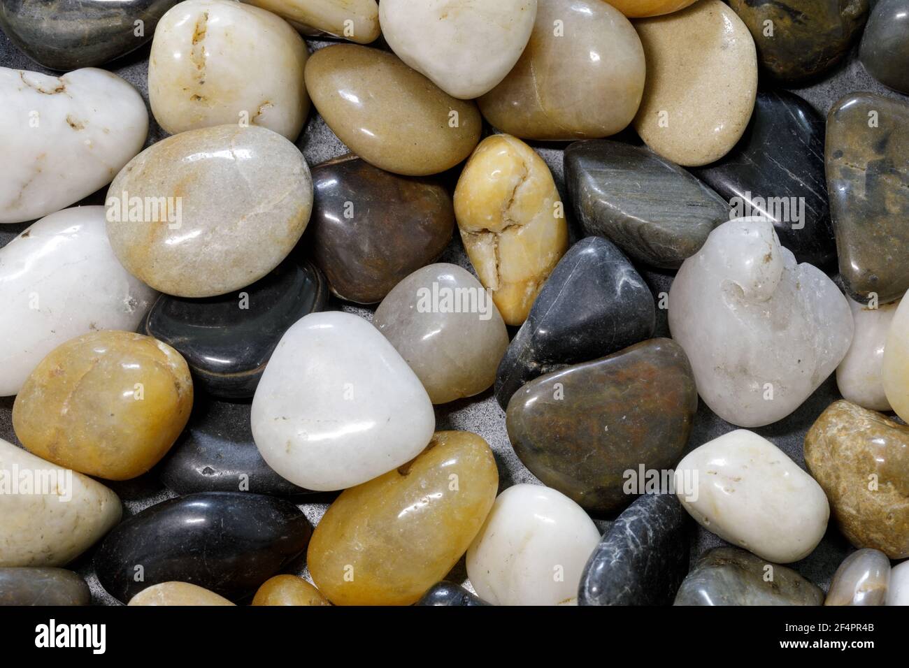 Rounded river rocks hi-res stock photography and images - Alamy
