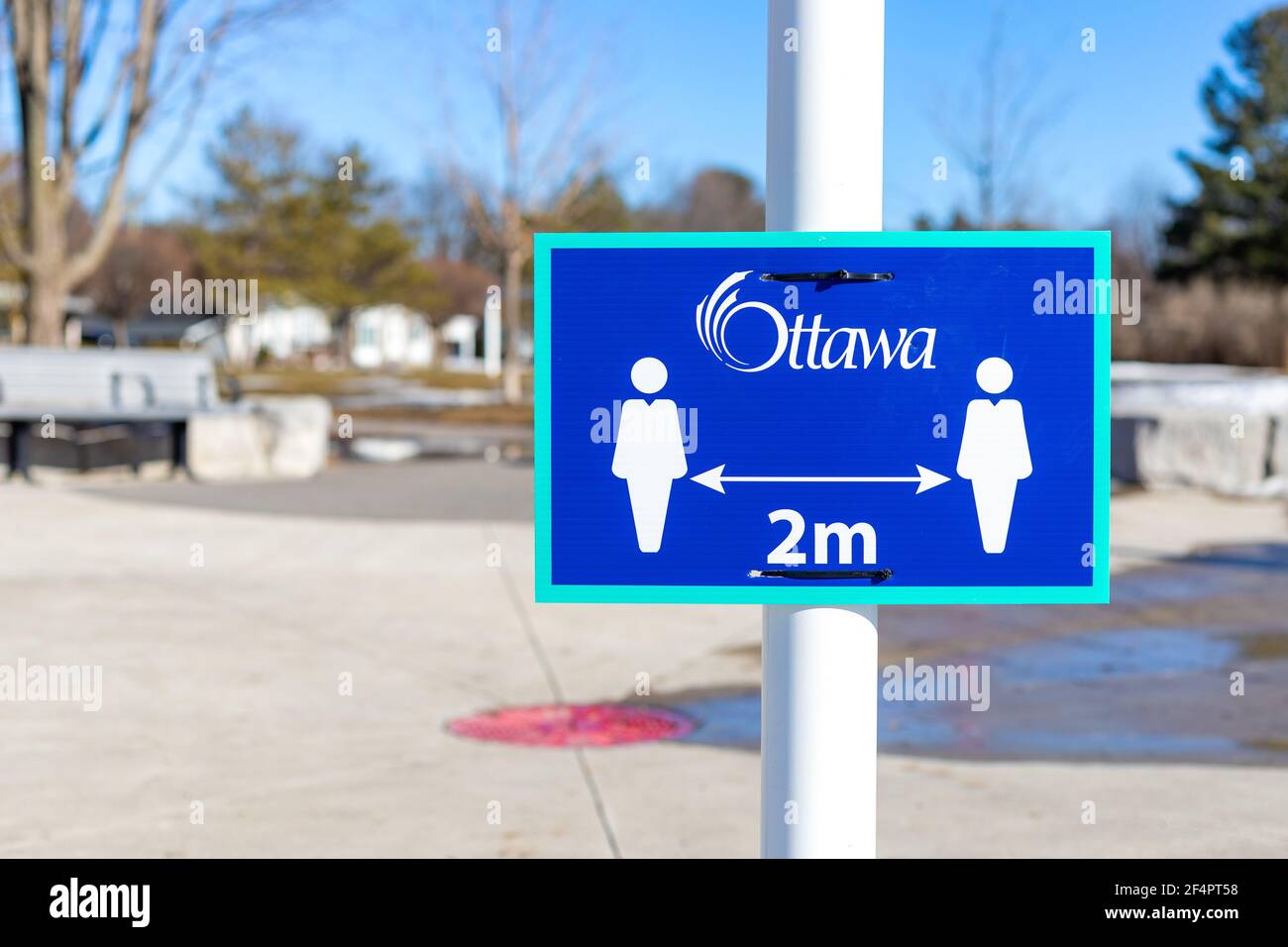 Ottawa, Canada - March 20, 2021: physical distance of 2 m sign in park ...