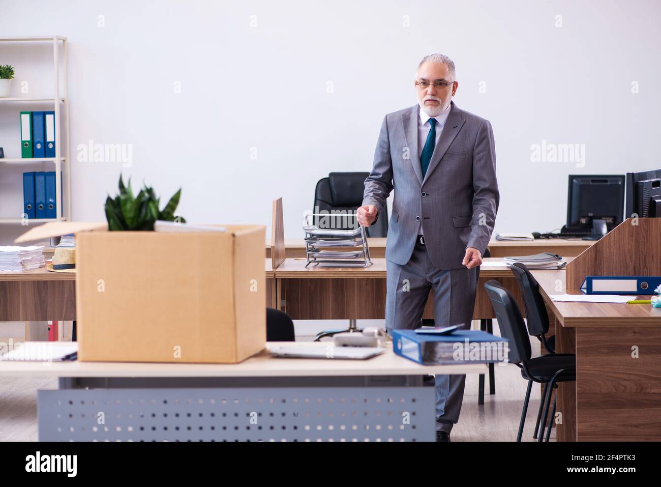 Old employee being fired hi-res stock photography and images - Alamy
