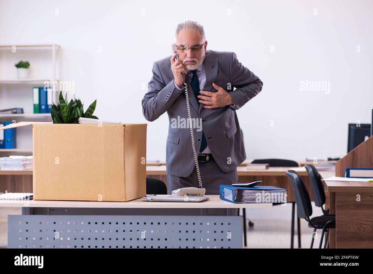 Old employee being fired from his work Stock Photo - Alamy