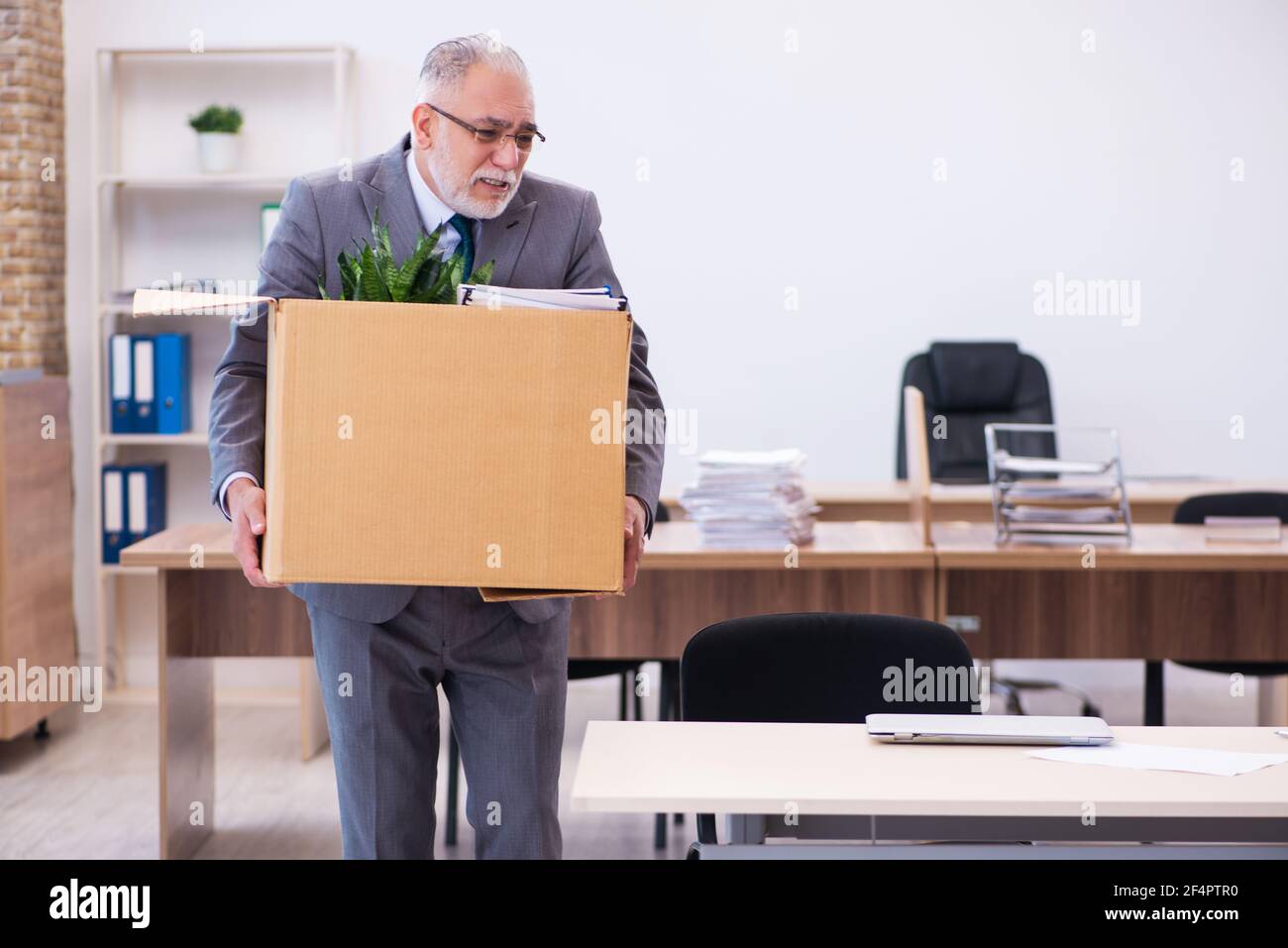 Old employee being fired from his work Stock Photo - Alamy