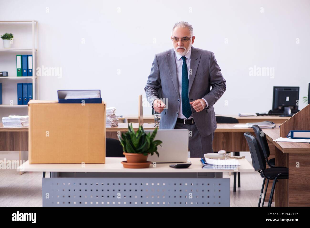Old employee being fired from his work Stock Photo - Alamy
