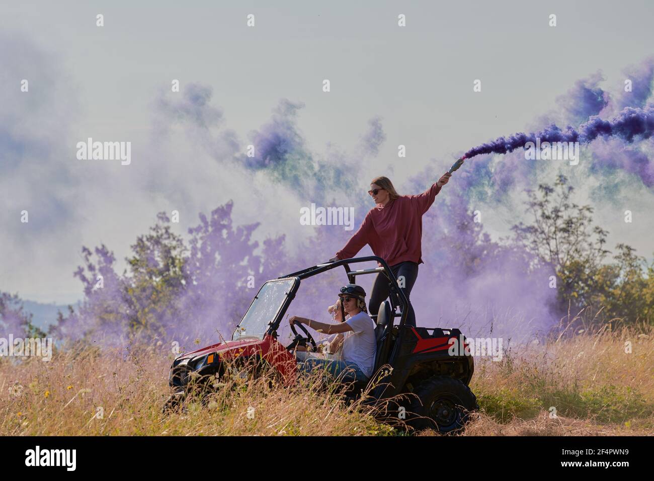 colorful torches while driving a off road buggy car Stock Photo - Alamy