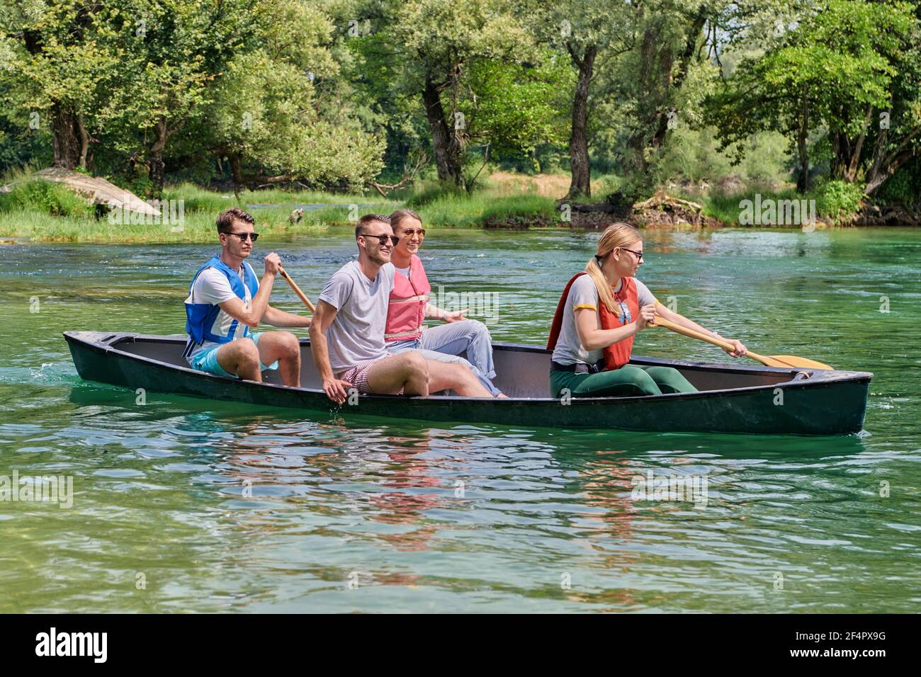 Group adventurous explorer friends are canoeing in a wild river Stock ...