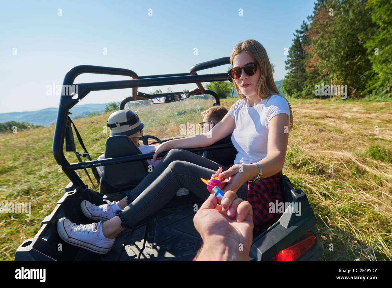 colorful torches while driving a off road buggy car Stock Photo - Alamy