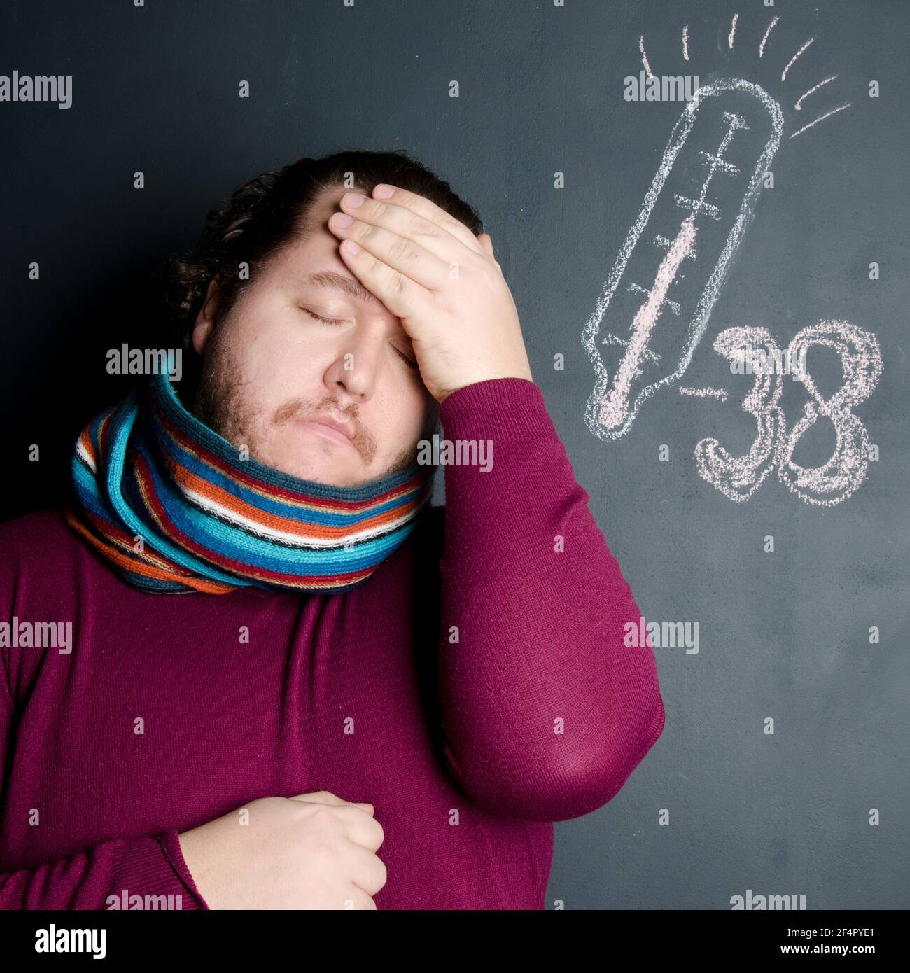 Colds and flu. Man sneezes Stock Photo - Alamy